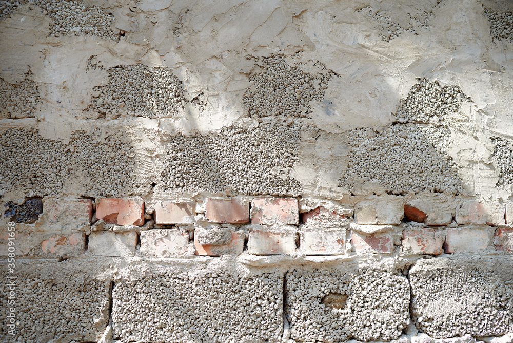 Wall background of expanded clay concrete blocks, bricks and plaster ...