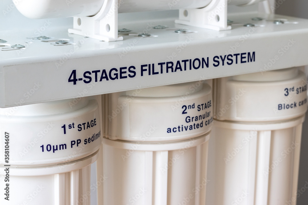 Four stages water filtration system for the home with granular ...