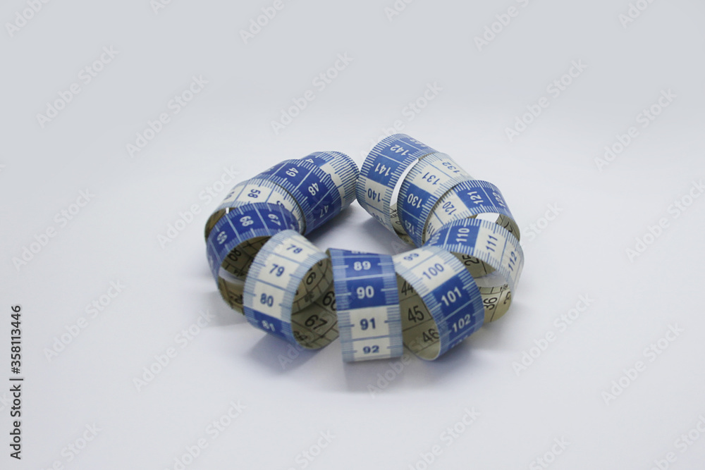 The plastic measuring tape is an instrument used to measure distances ...