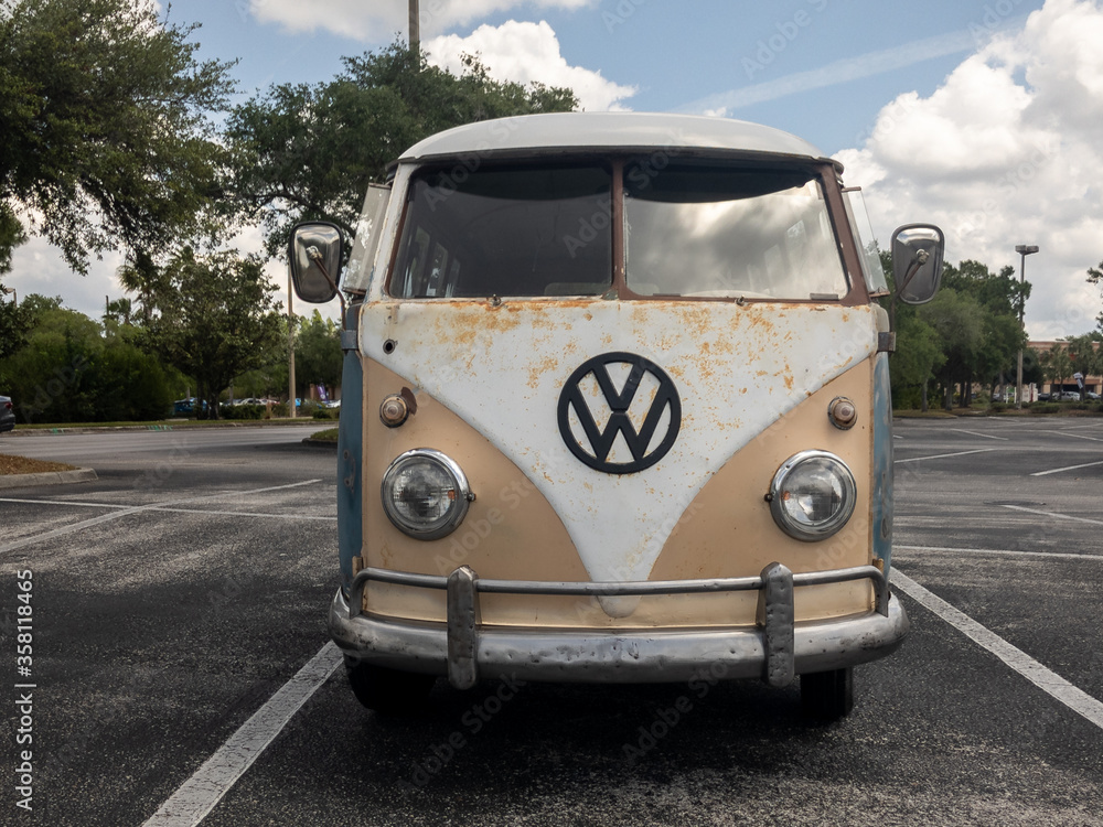Front View of a Classic Old Rusty Camper Van Parked at a Mall Parking ...