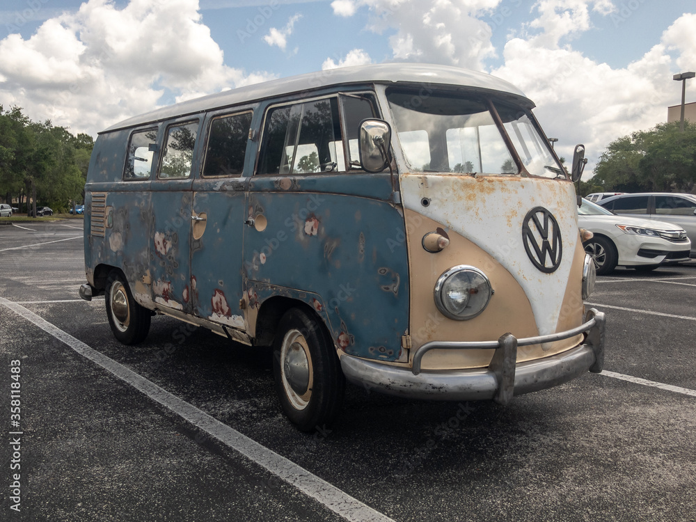 Front View of a Classic Old Rusty Camper Van Parked at a Mall Parking ...