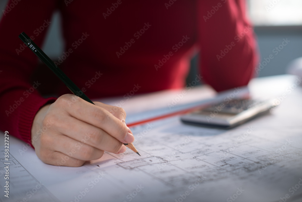 Architect working on blueprint. Architects workplace - architectural ...