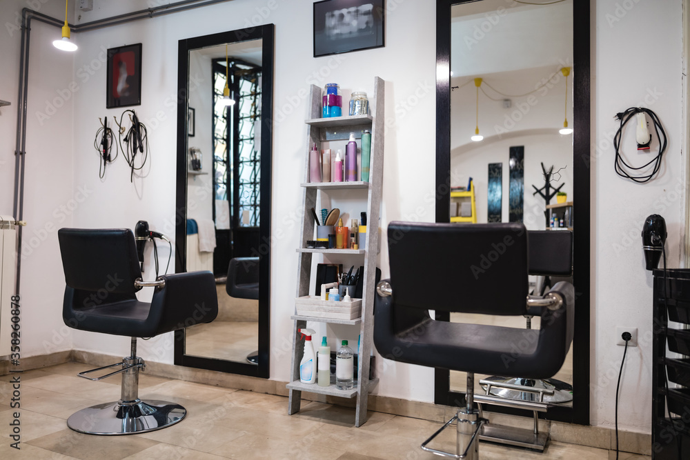 Empty hair salon interior with chairs and mirrors. Stock Photo | Adobe ...