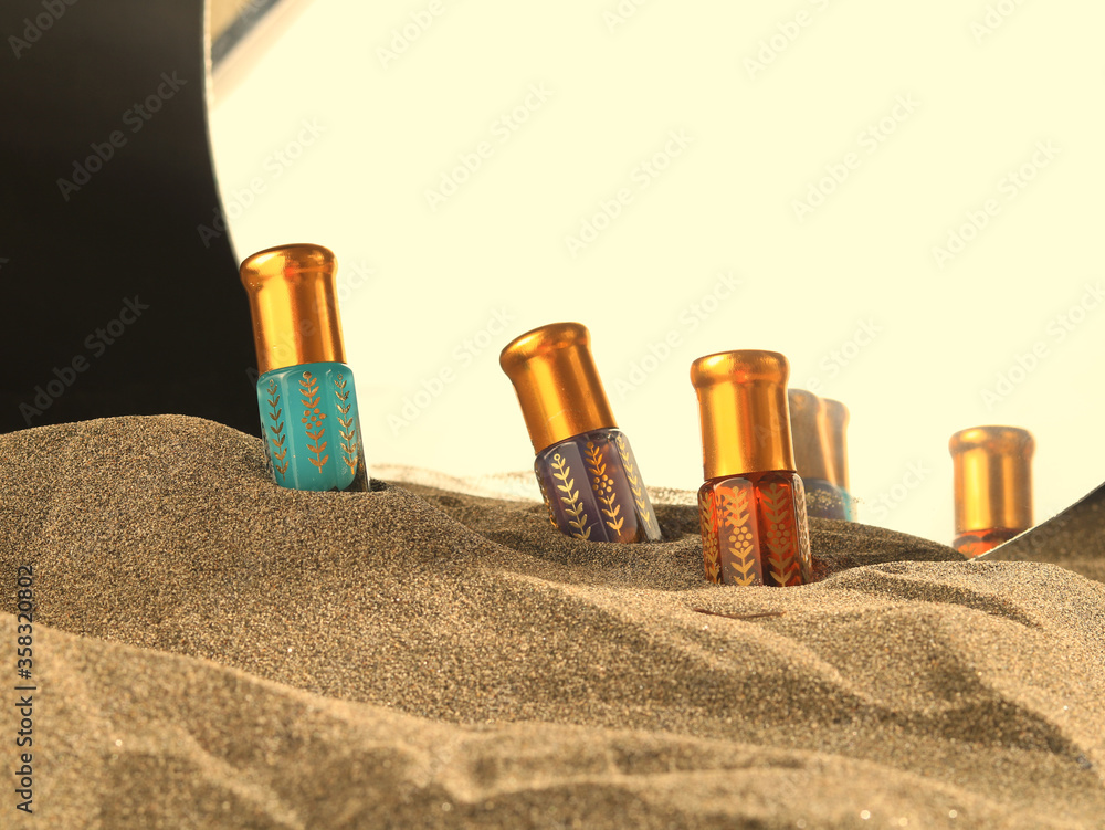 Arabian oud attar perfume in mini bottles. Stock Photo | Adobe Stock