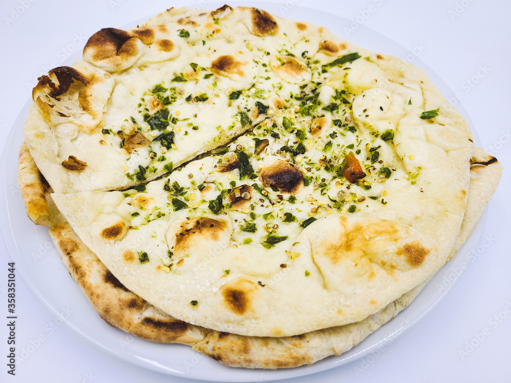 Indian foods concept: Indian bread called "Naan", chili naan on white ...