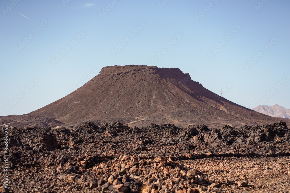 zone of black volcanic rocks in the middle of the desert Stock Photo ...