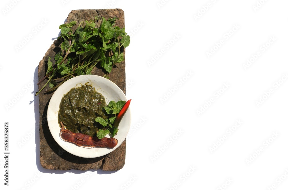 Pudina Chutney or Field Mint Leaves Paste in a Plate with Raw ...