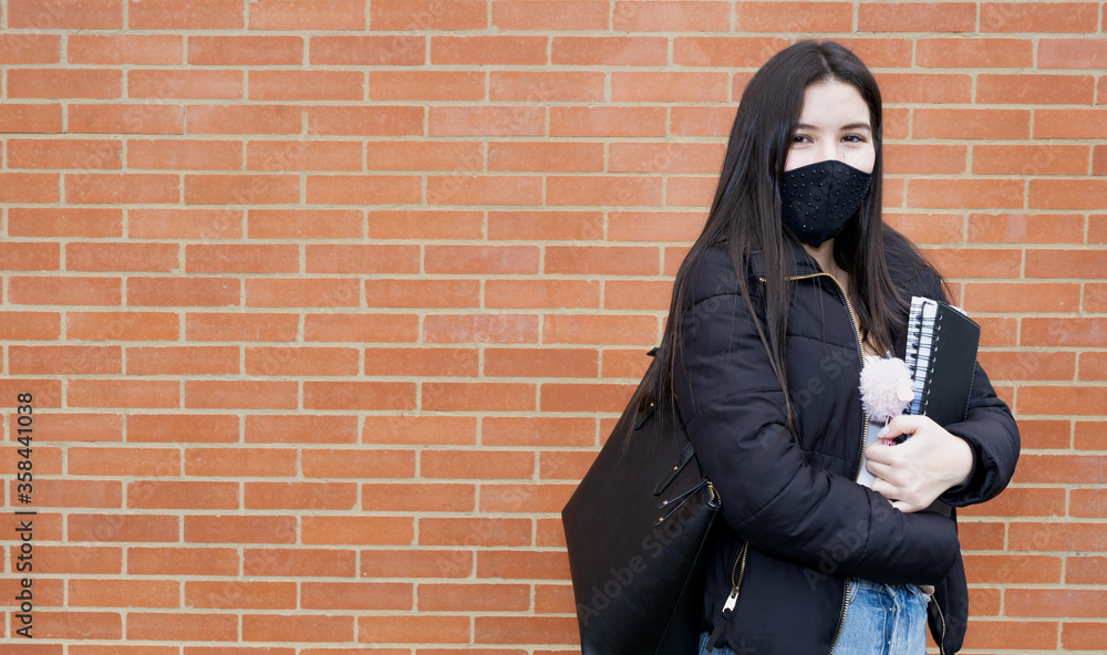young girl returns to class after confinement Stock Photo | Adobe Stock