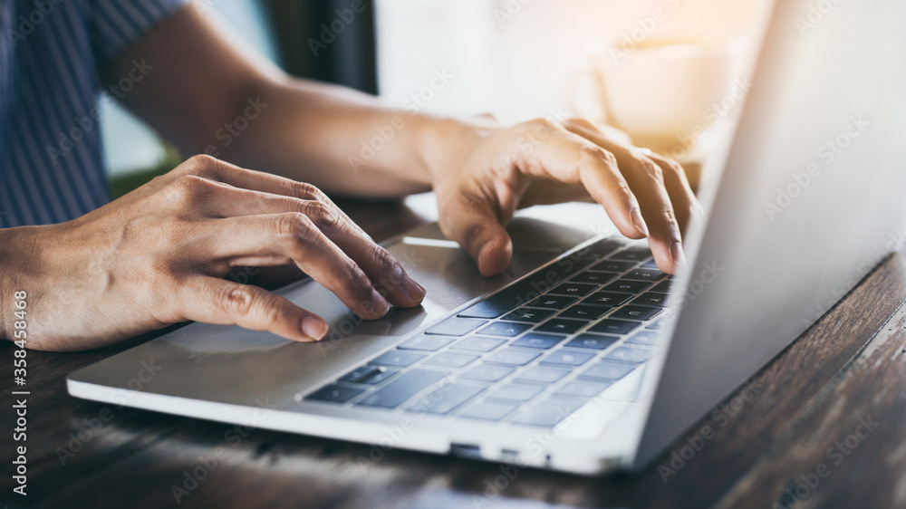 using computer.hand typing keyboard laptop online chatting search form ...