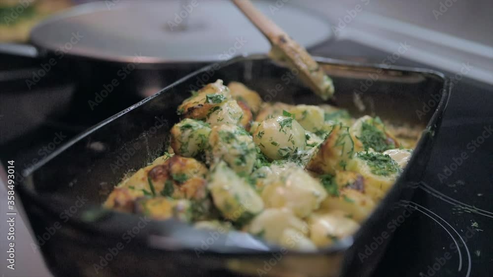 1920x1080 Chef grinds pepper, garnishes, flips sauteed potatoes. Stock ...