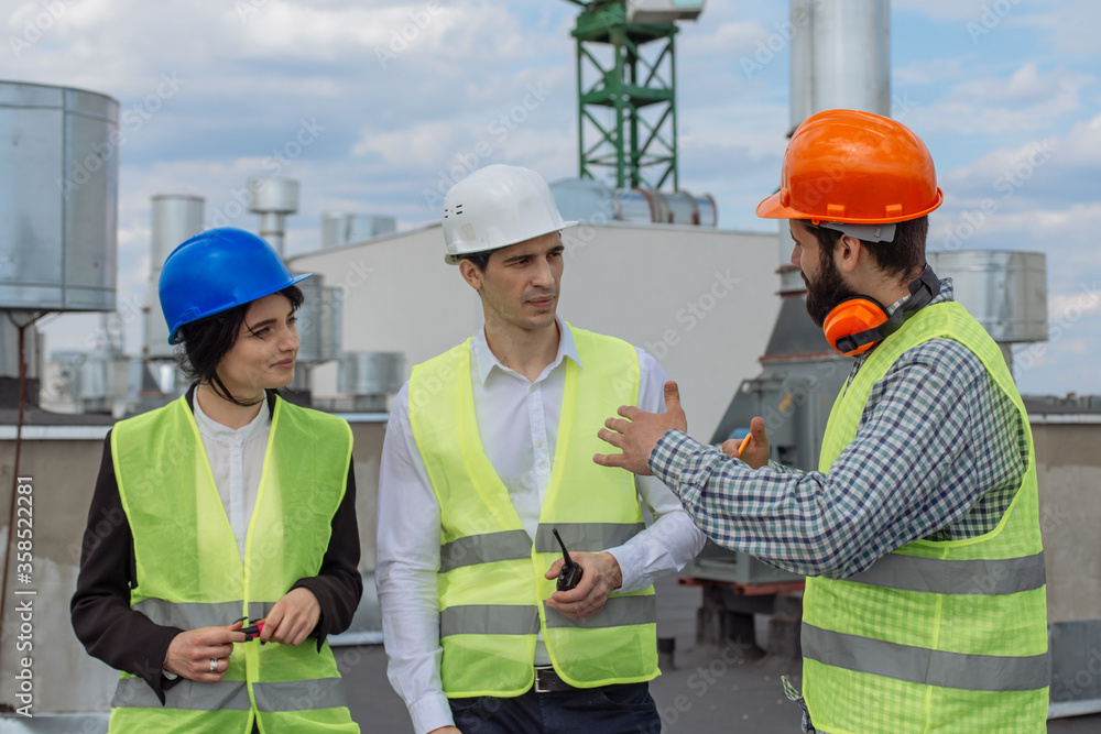 Good looking multiethnic group of workers in a modern building ...