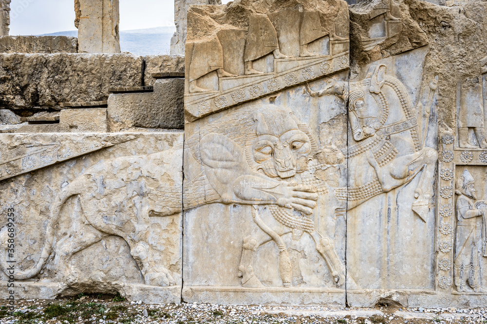 It's Relief of a lion biting antelope.Persepolis, the ceremonial ...
