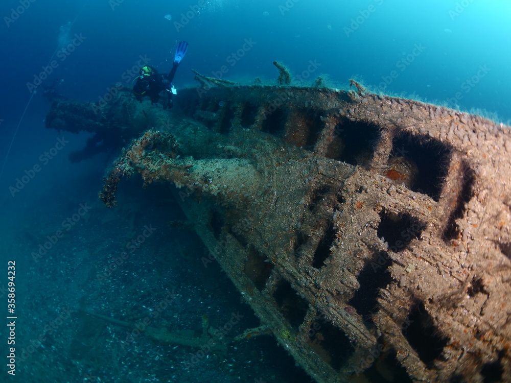 scuba divers exploring shipwreck underwater u boat submarine from world ...