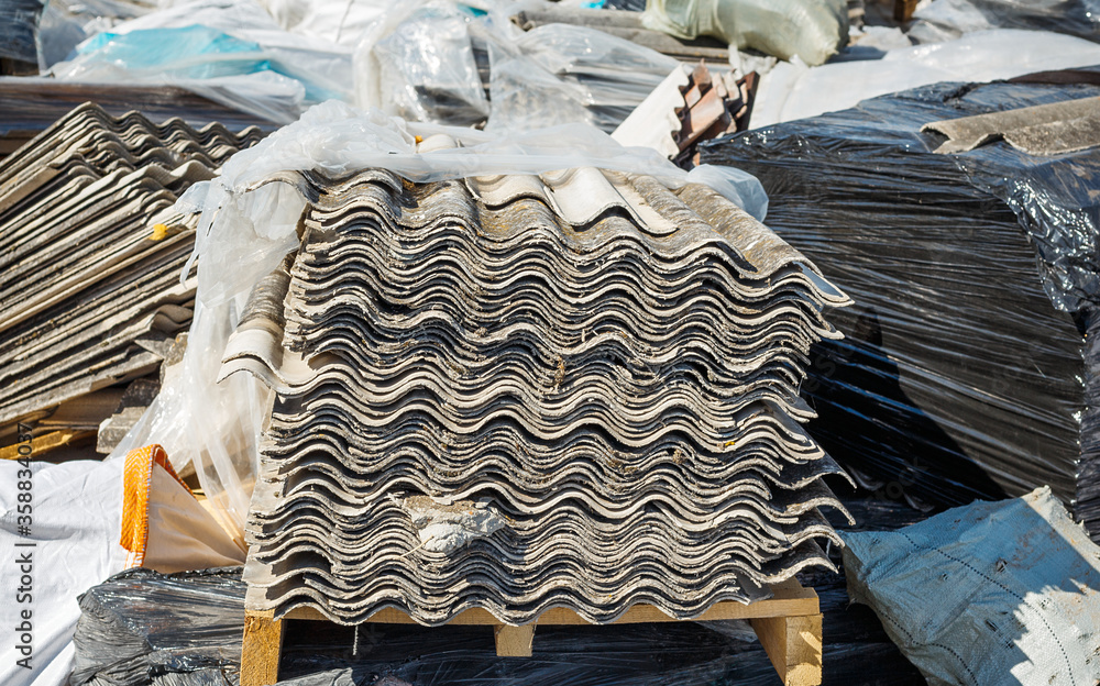 Asbestos landfill . Roof covering material with asbestos fiber ...