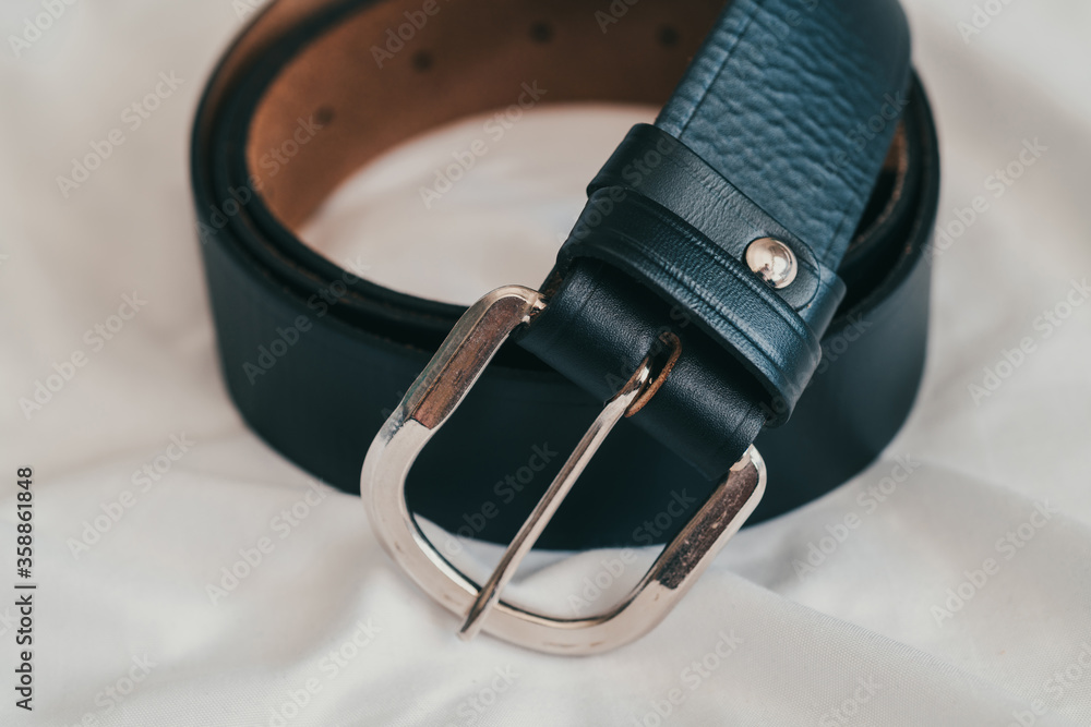 leather belt on the bed prepared for spanking. domestic discipline and ...