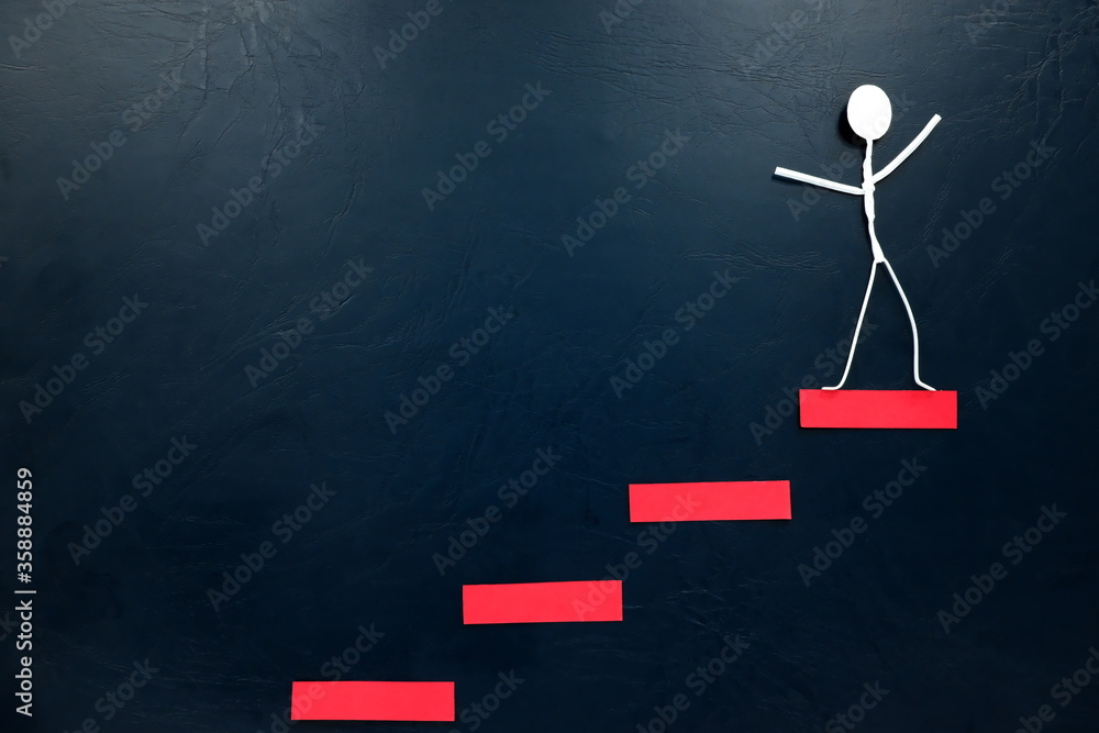 Success and achievement concept. Man stick figure on top of red ladder ...