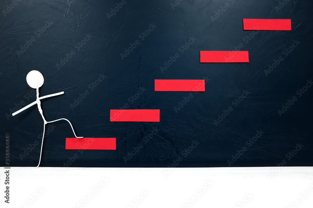 Ladder to success concept. Stick man taking first step on a red ...