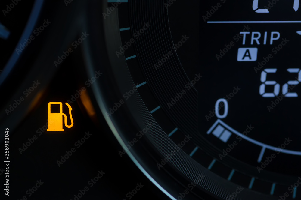 Empty fuel warning light in car dashboard. Fuel pump icon. gasoline ...