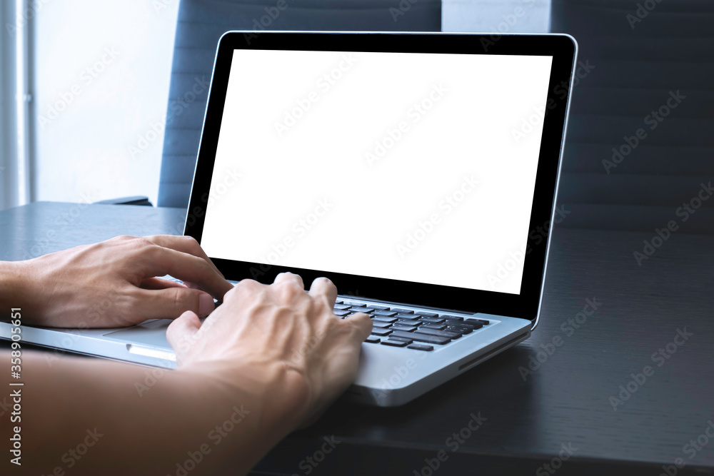 Hand typing on laptop or notebook keyboard at meeting room. isolated ...