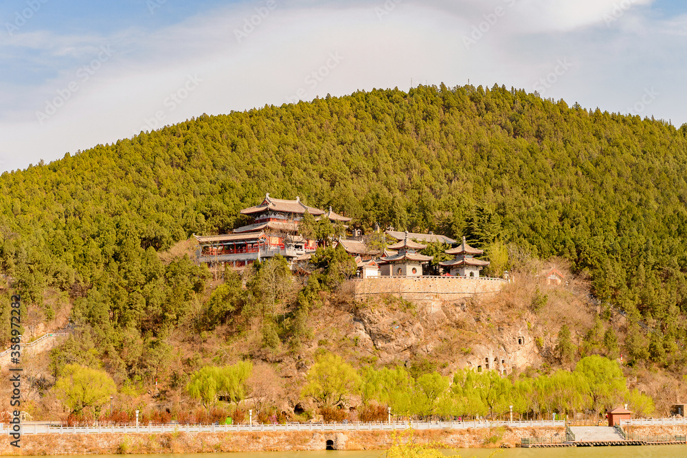 It's Caves at the Longmen Grottoes ( Dragon's Gate Grottoes) or Longmen ...