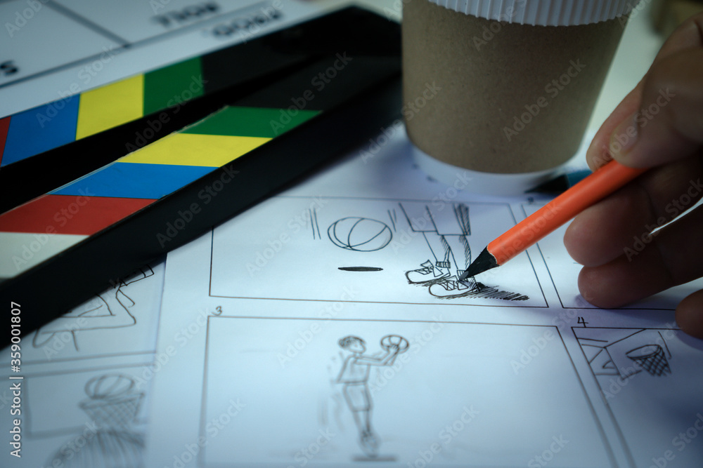 Designer creative drawing in storyboard for film movie, Video Pre ...