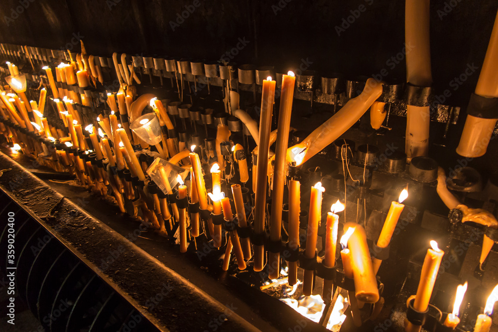 lighted candles at the Marian shrine in Fatima Stock Photo | Adobe Stock