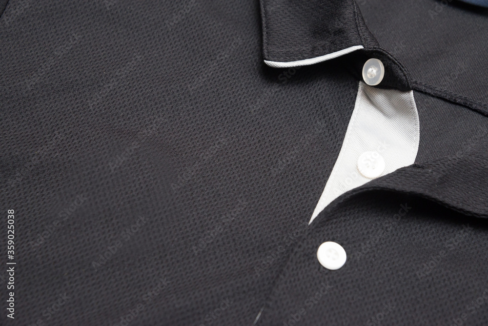 Blank black polo shirt with three white buttons. Polo shirt isolated on ...