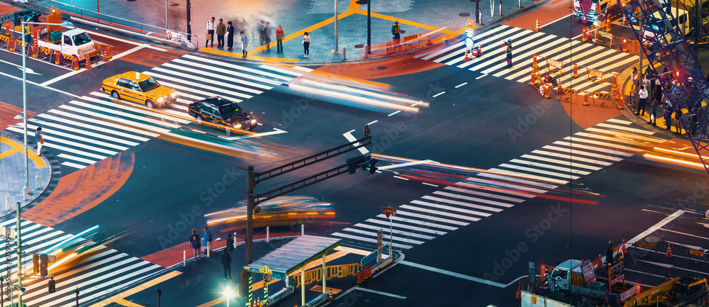 Photo & Art Print People and traffic cross the famous scramble ...