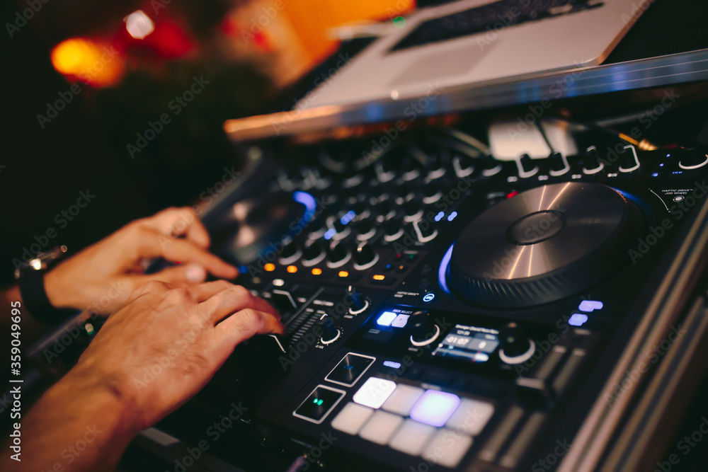 Overhead shot of Dj controling red party dj audio equipment.Turntable ...
