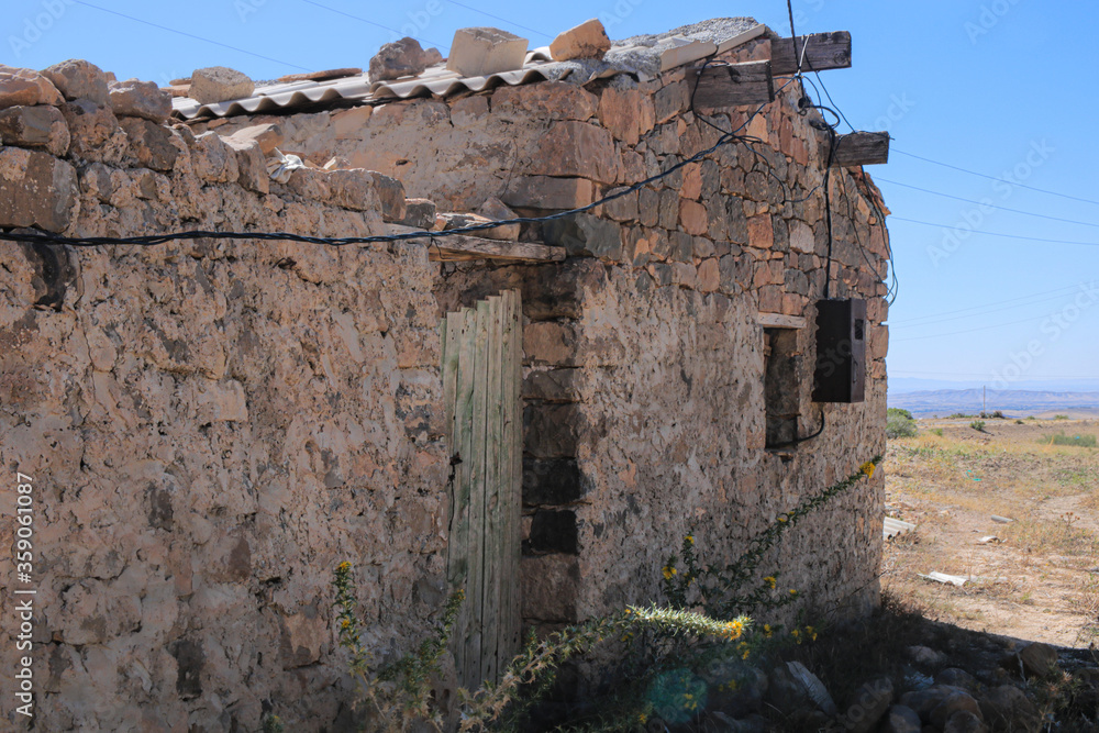 The interior of the abandoned traditional Arab mud brick house ...