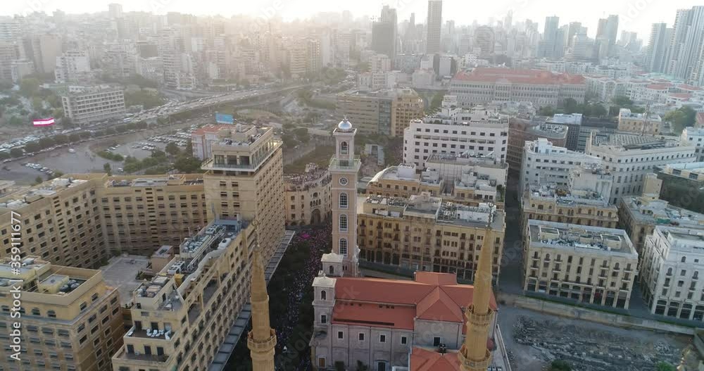 Beirut, Lebanon 2019 : day drone shot track back from church and mosque ...