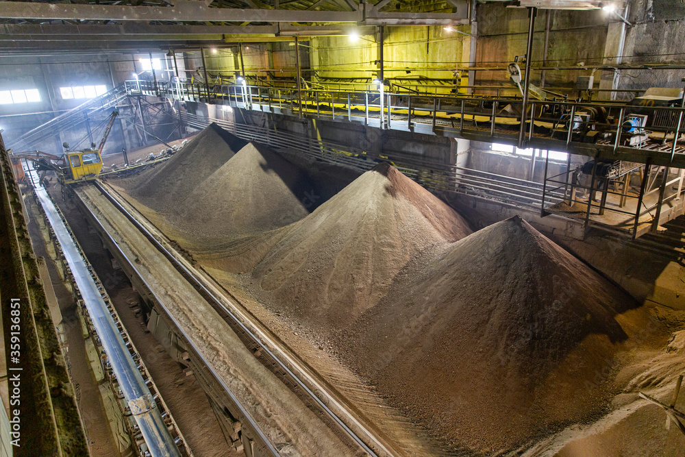 Clay sand storage. Transportation and sorting of clay on conveyor ...