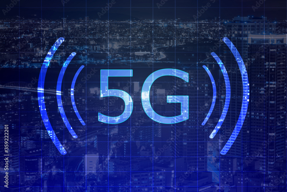 The concept of a 5G network against the background of a night city ...