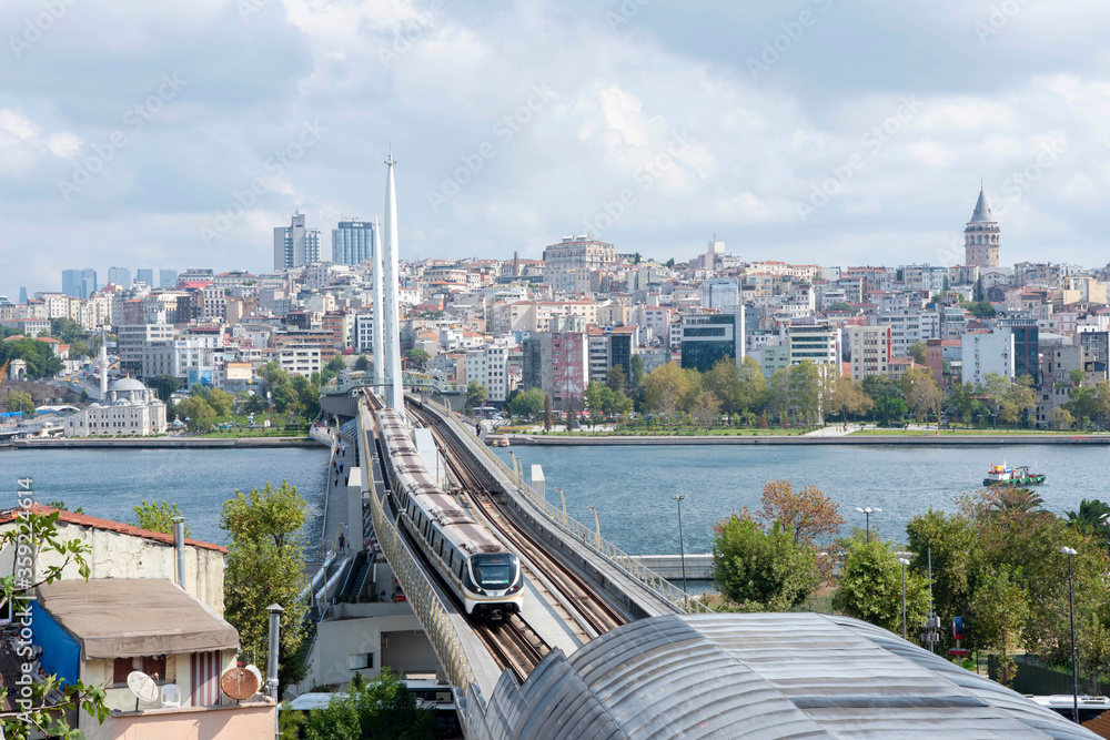Sunset View of Halic Metro Bridge. The bridge connects the Beyoğlu and ...