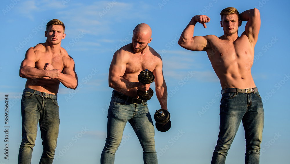 Body uses protein to build new muscle. Strong men blue sky background ...