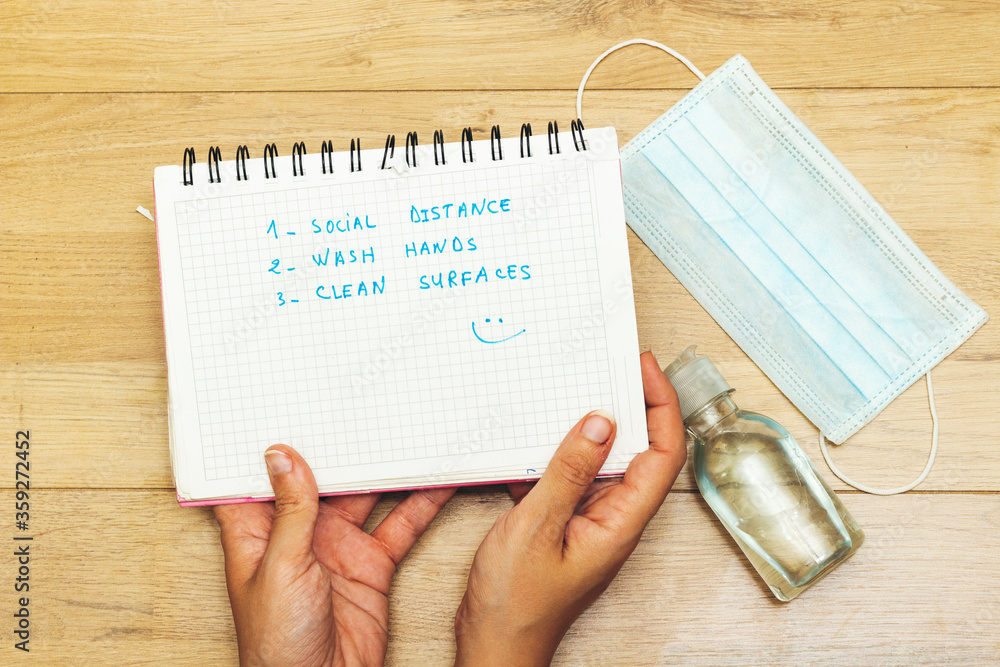 Coronavirus COVID-19 health safety guidelines. notebook with rules ...