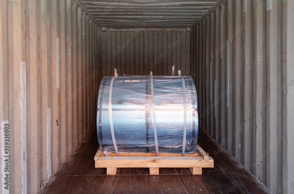 Steel coils container stuffing for export, steel coils on wooden ...