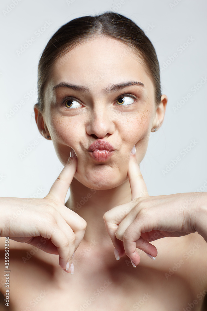 Emotional young woman face portrait with doubt, facial expression ...