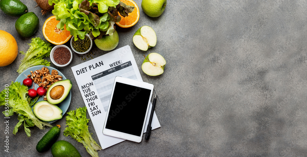 Healthy diet meal plan. Weight loss program on the sheet and tablet ...