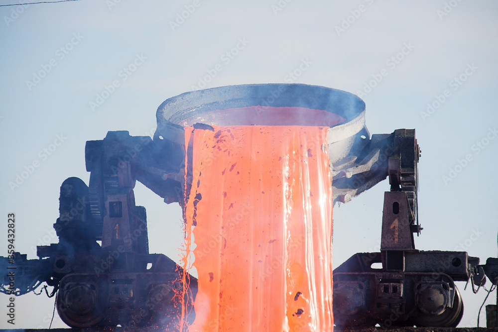 General view of the discharge of slag from the train at a metallurgical ...