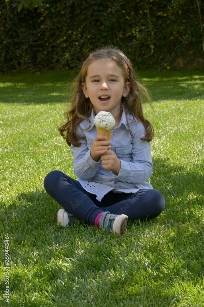 Little Girl Singing with A Ice Cream Microphone Stock Photo | Adobe Stock
