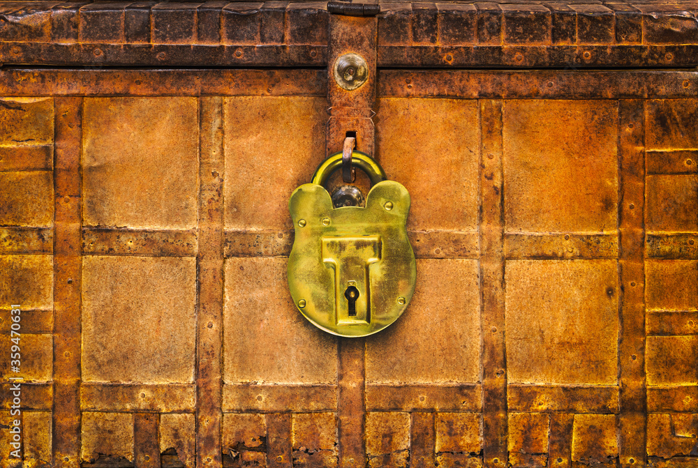 Ancient locked rusted treasure chest with large brass lock Stock Photo ...