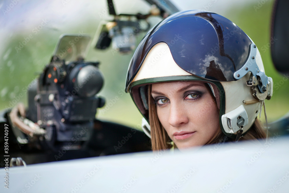 Young girl in the cockpit of jet aircraft Stock Photo | Adobe Stock