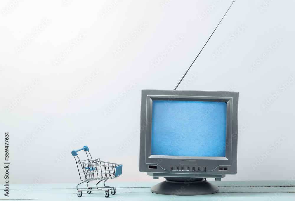 TV shop. Antenna old-fashioned retro tv with mini supermarket trolley ...
