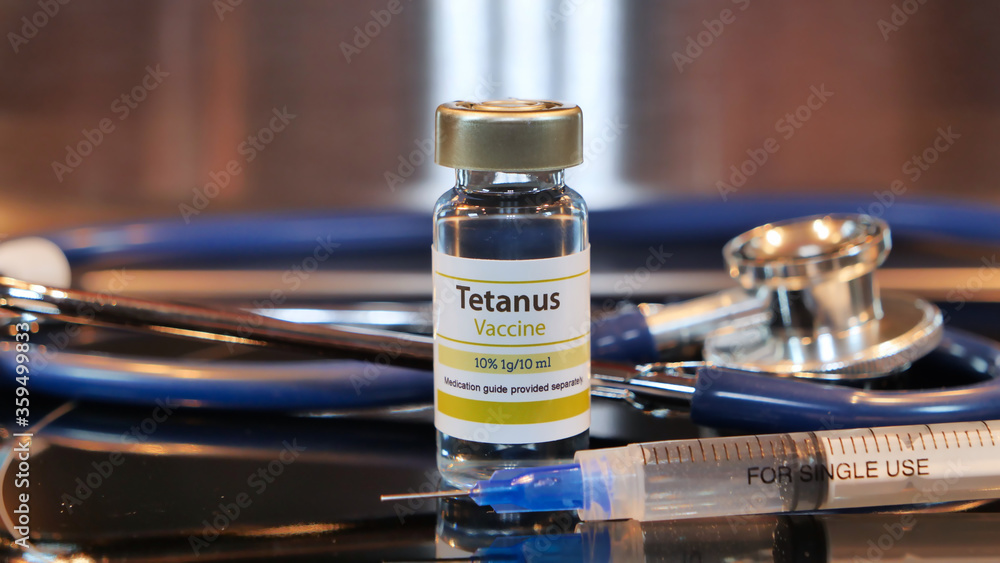 Vial of tetanus vaccine with syringe and stethoscope Stock Photo ...