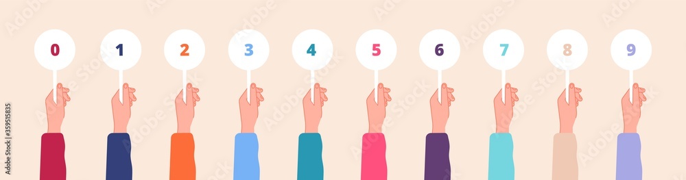 Hand holding cards. Judges marks, color scorecards in hands ...