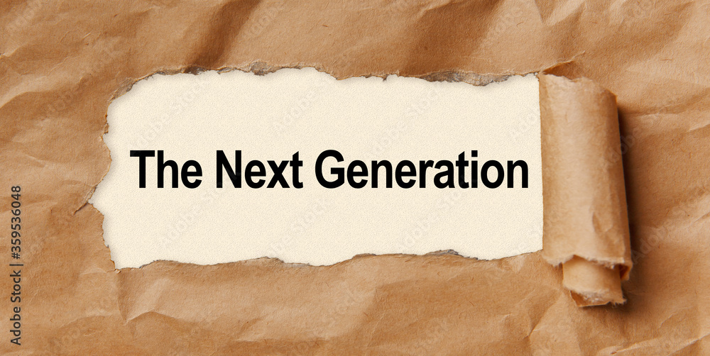 Foto de Text The next generation appearing behind torn brown paper do ...