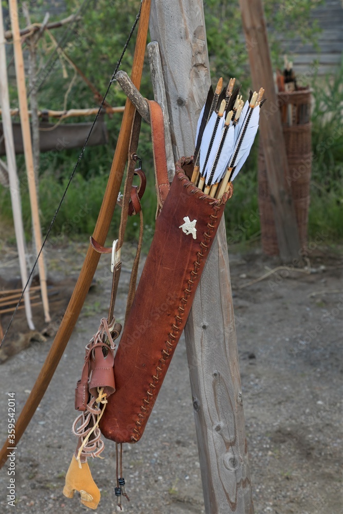 leather bow quiver with feathered arrows, viking longbow, archery Stock ...