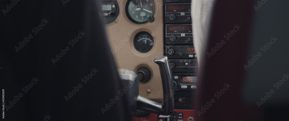 Instrumental panel yoke control wheel hand pilot flying small airplane ...