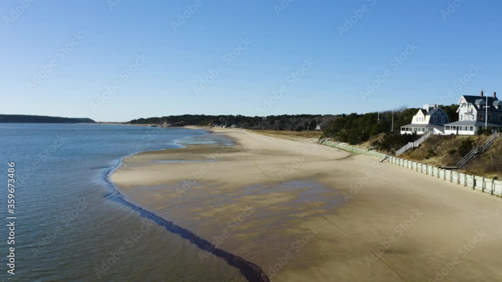 Video Stock The camera flys up Mayo beach in Wellfleet harbor. You can ...
